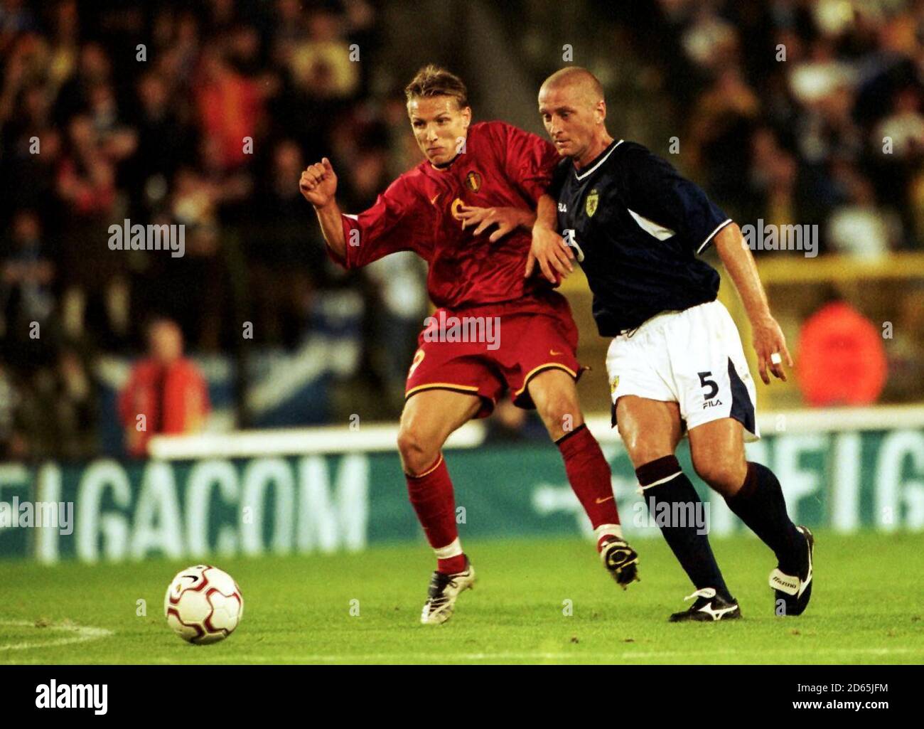 Scotland's Matt Elliott and Belgium's Wesley Snock battle for the ball ...