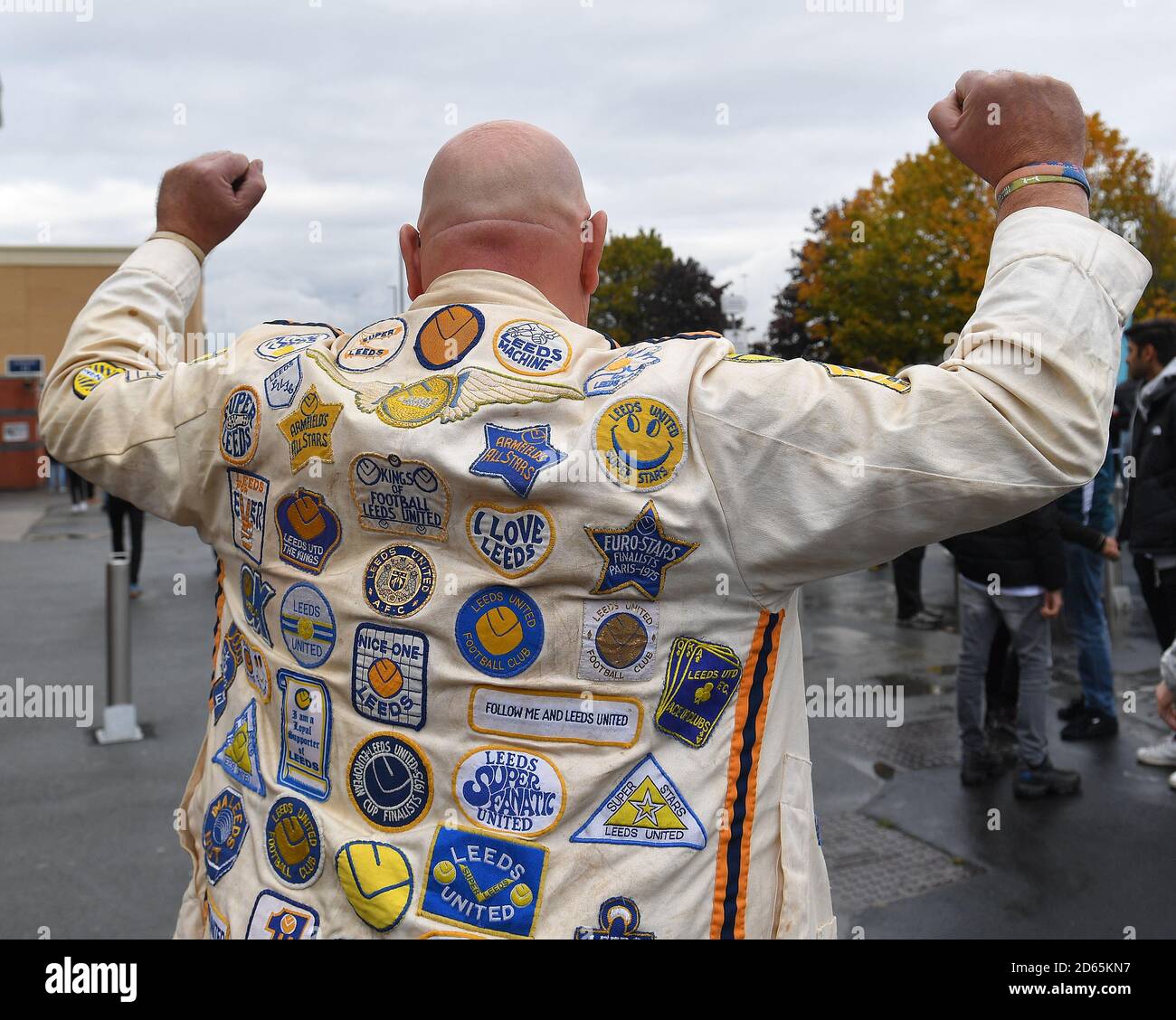 A fan with a old LUFC Coat Stock Photo - Alamy