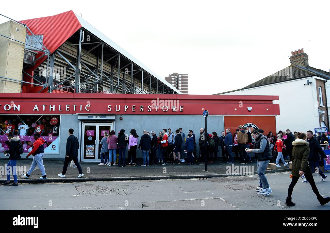 Fans queue up outside the club store Stock Photo - Alamy