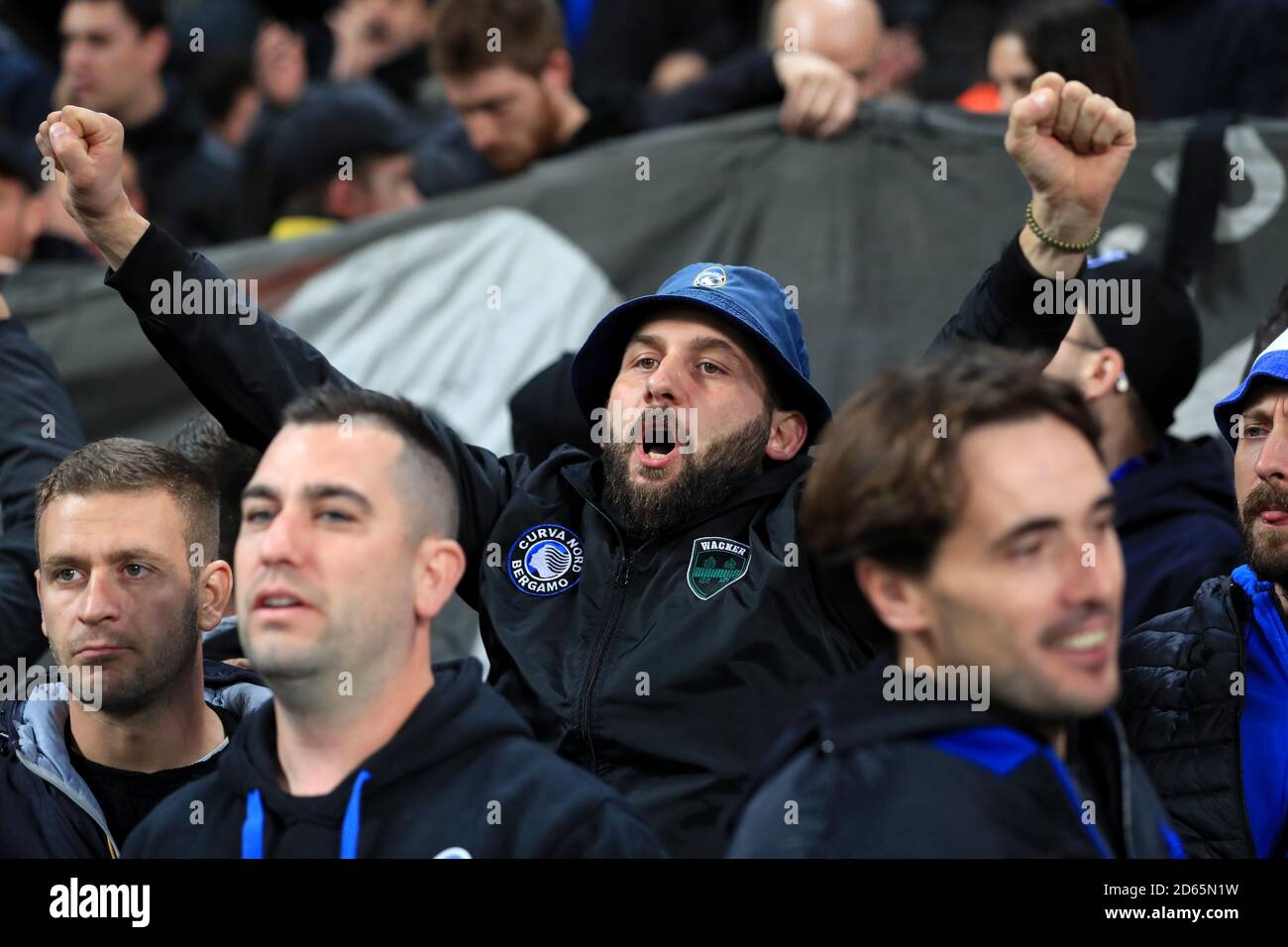 Atalanta fans in the stands show their support Stock Photo - Alamy