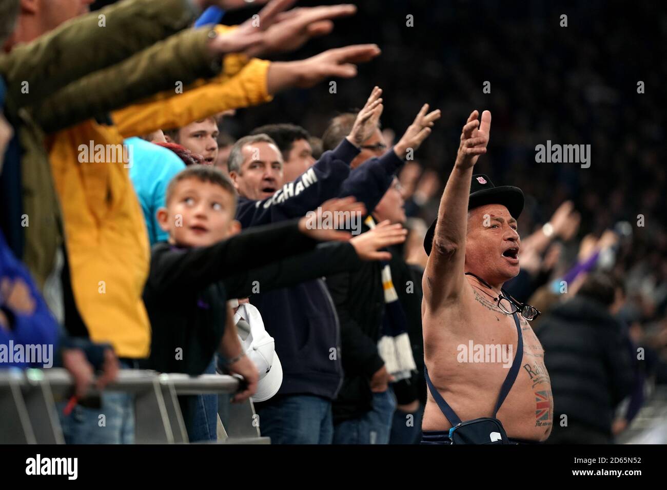 Tottenham Hotspur fans celebrate in the stands Stock Photo - Alamy