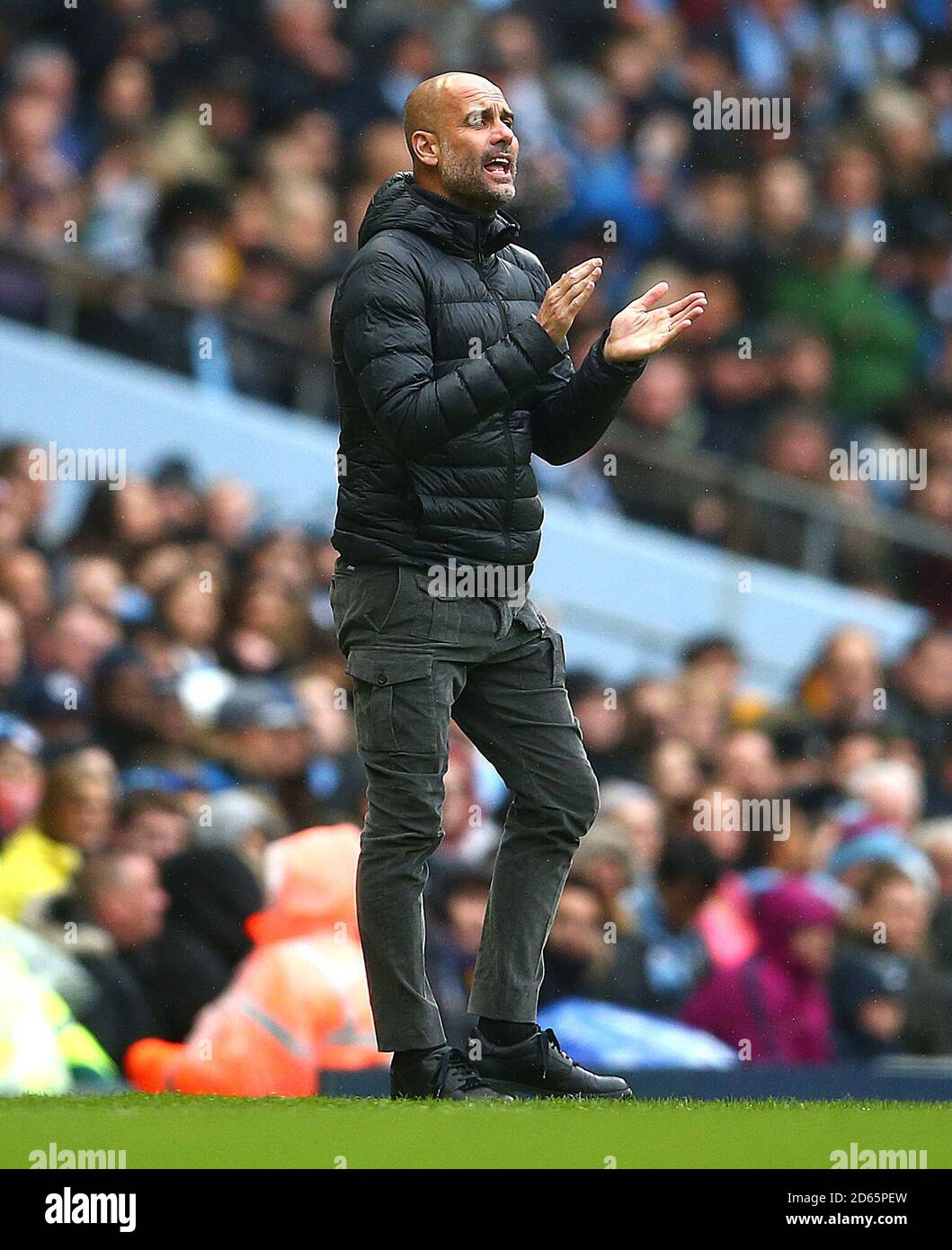 Manchester City manager Pep Guardiola gestures on the touchline Stock ...