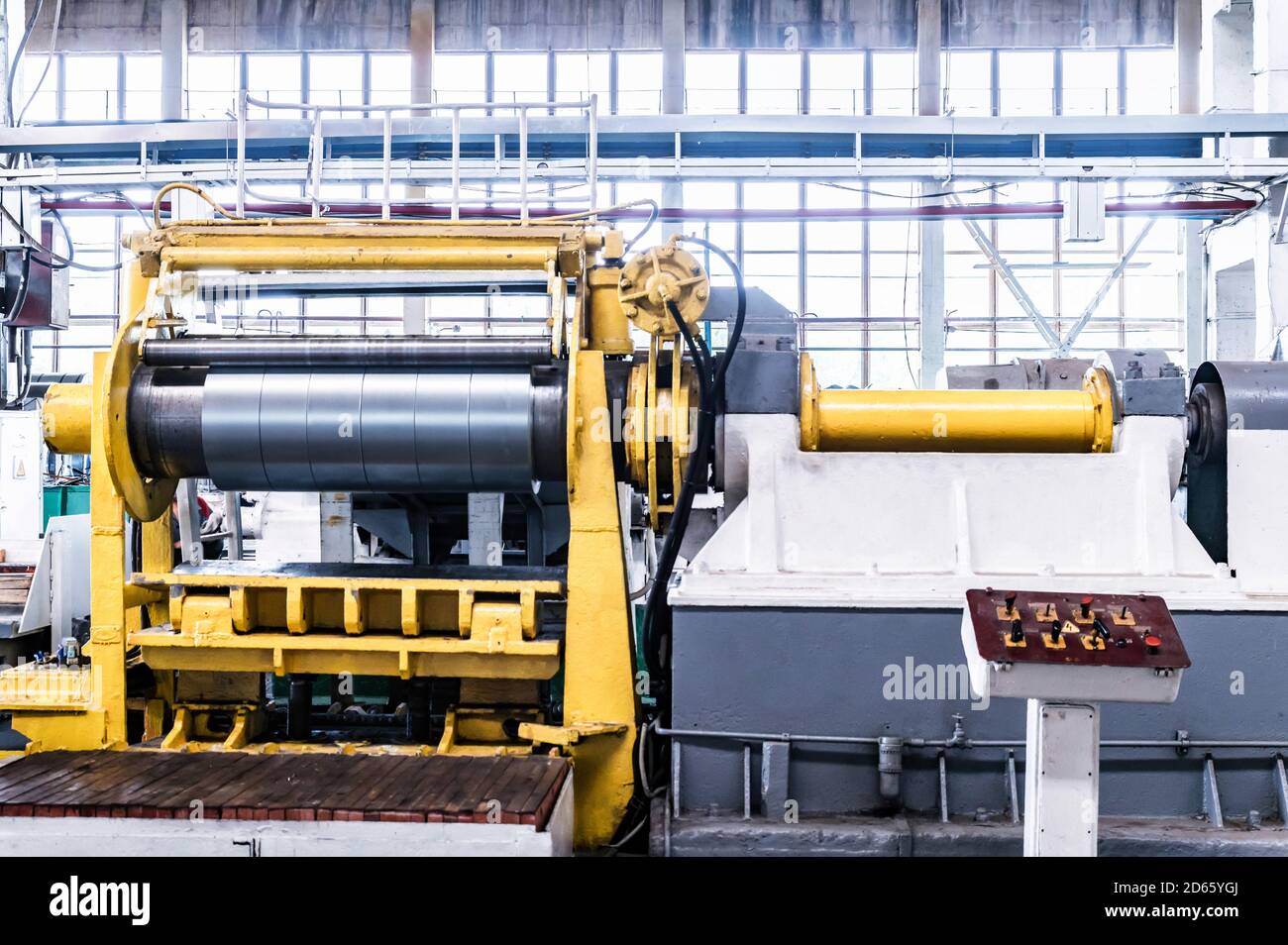 Industrial control panel with yellow red buttons on the modern tractor ...