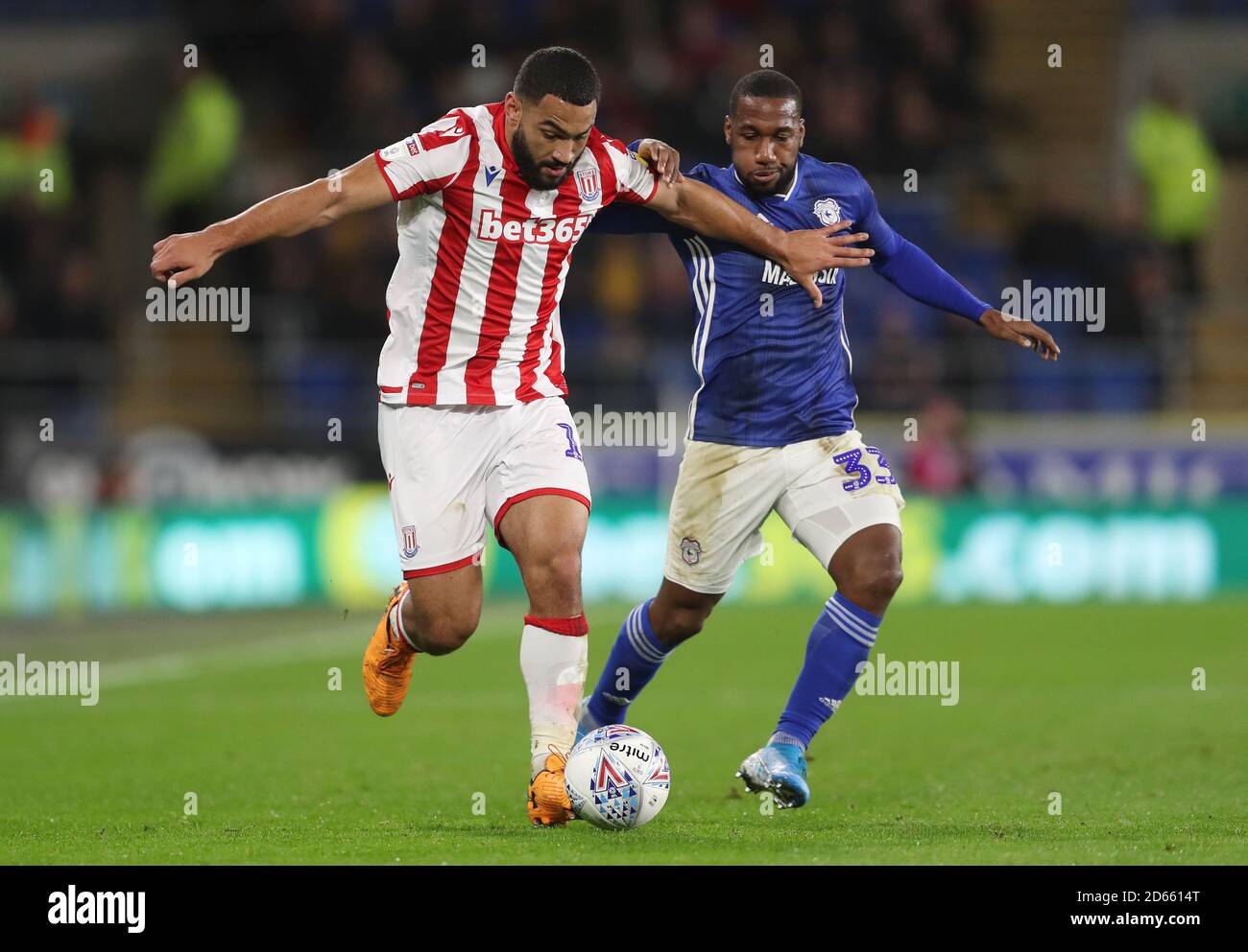 Cardiff City's Junior Hoilett and Stoke City's Cameron Carter-Vickers ...