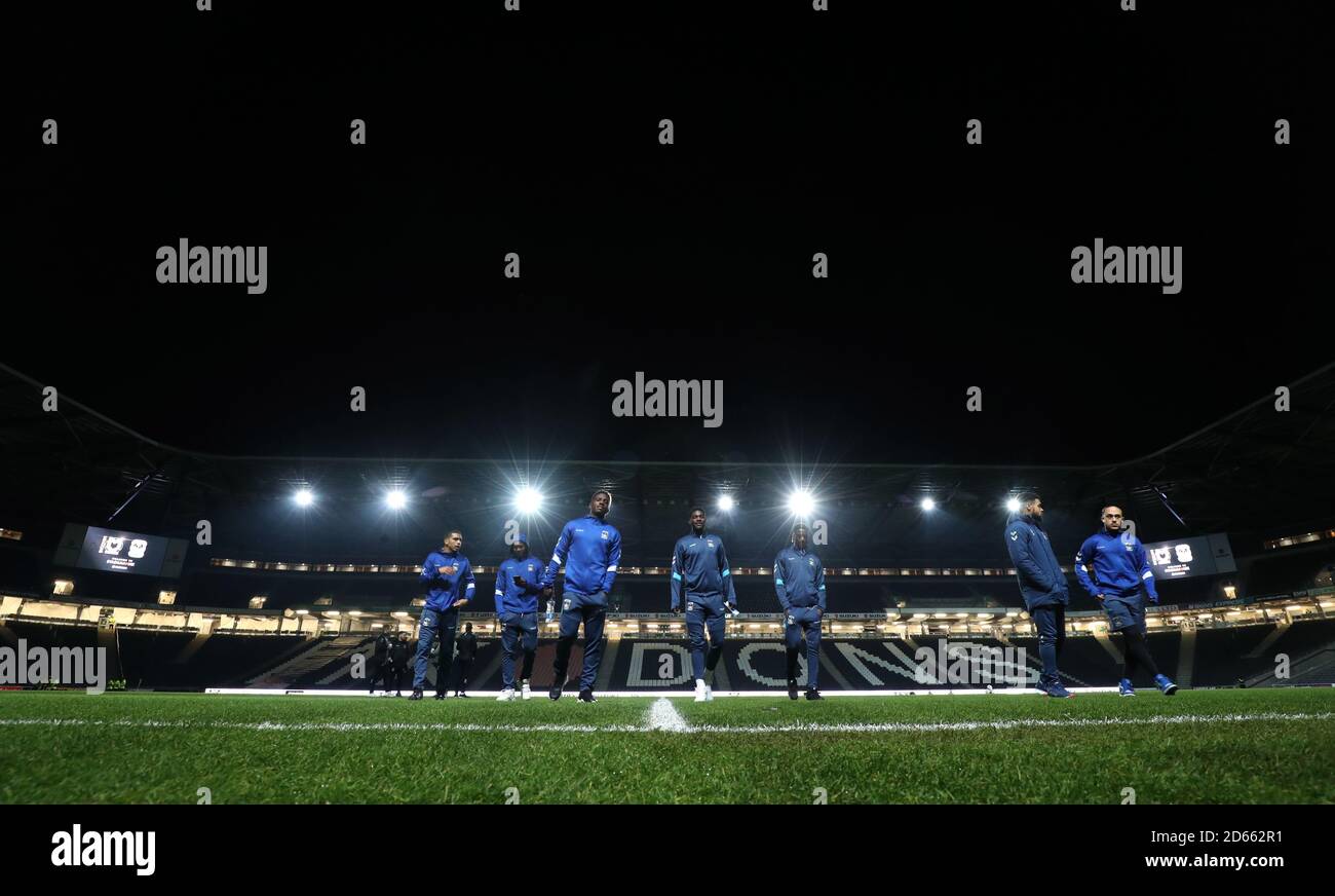 Coventry City players inspect the pitch ahead of the game Stock Photo ...