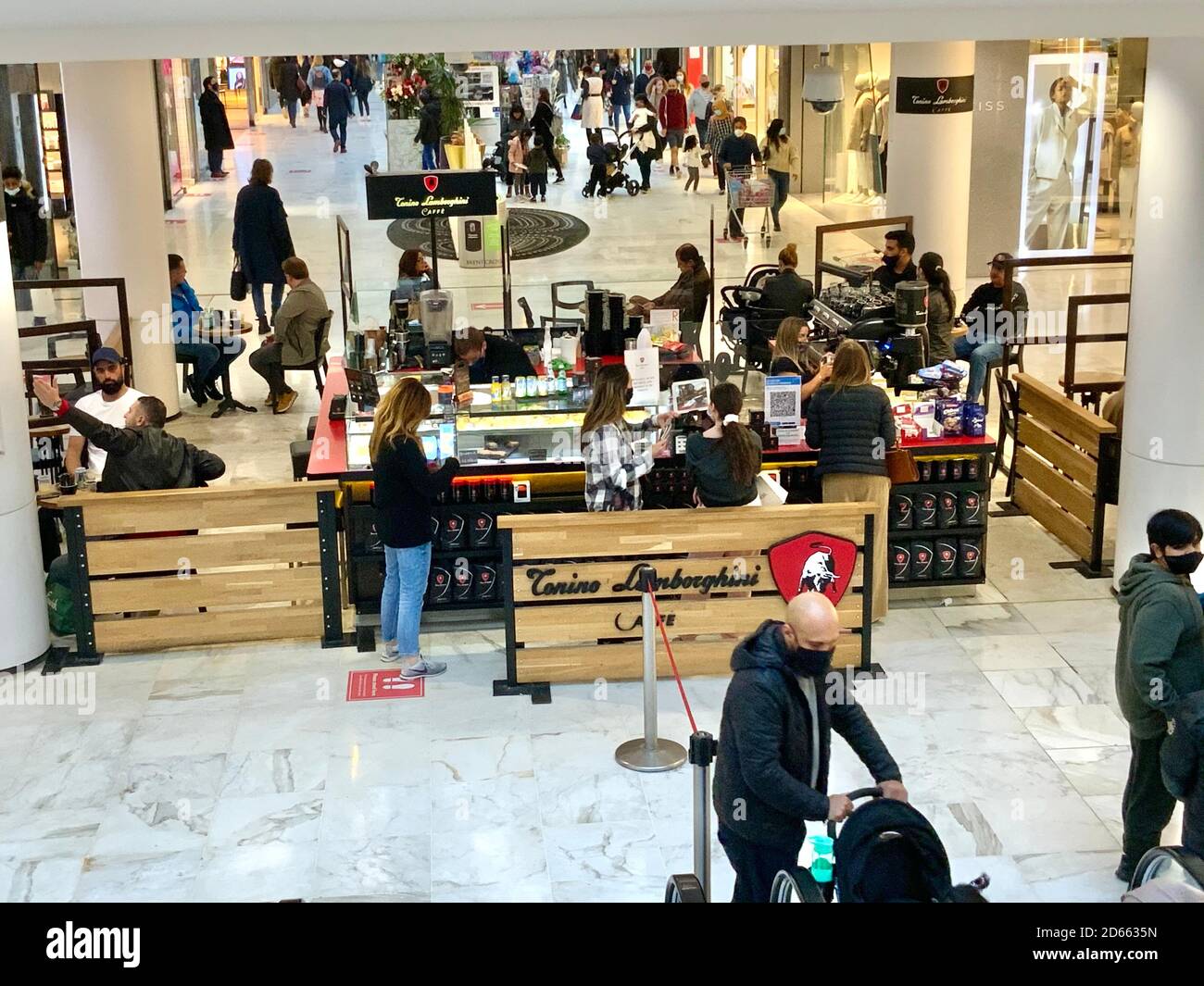 People wearing face masks in Brent Cross Shopping Centre, London ...