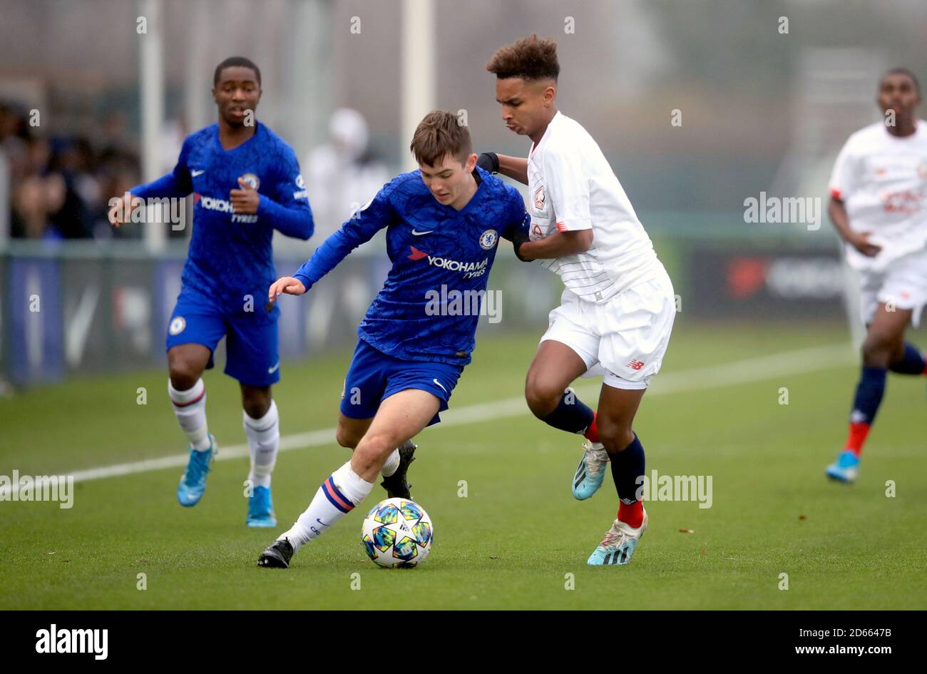 Chelsea's Joe Haigh (left) and Lille's Yassine Ben Hamed battle for the ...