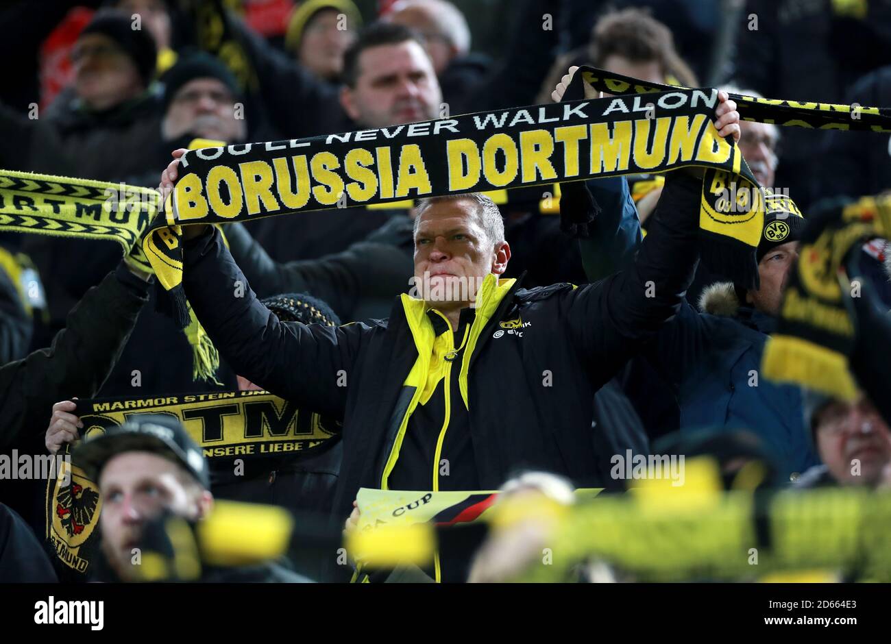 Borussia Dortmund fans show their support in the stands before the game ...