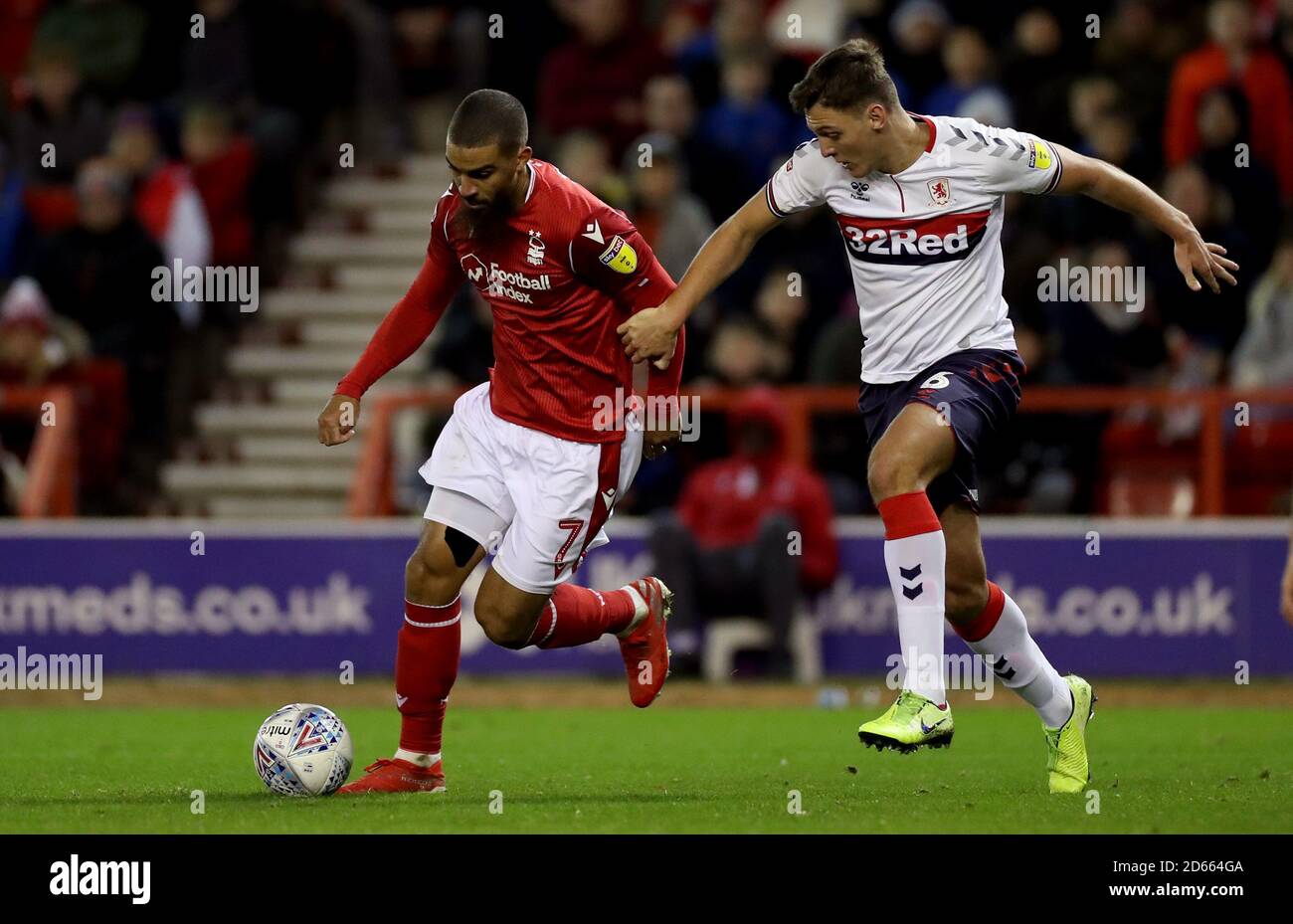 Nottingham Forest's Lewis Grabban (left) and Middlesbrough's Dael Fry ...