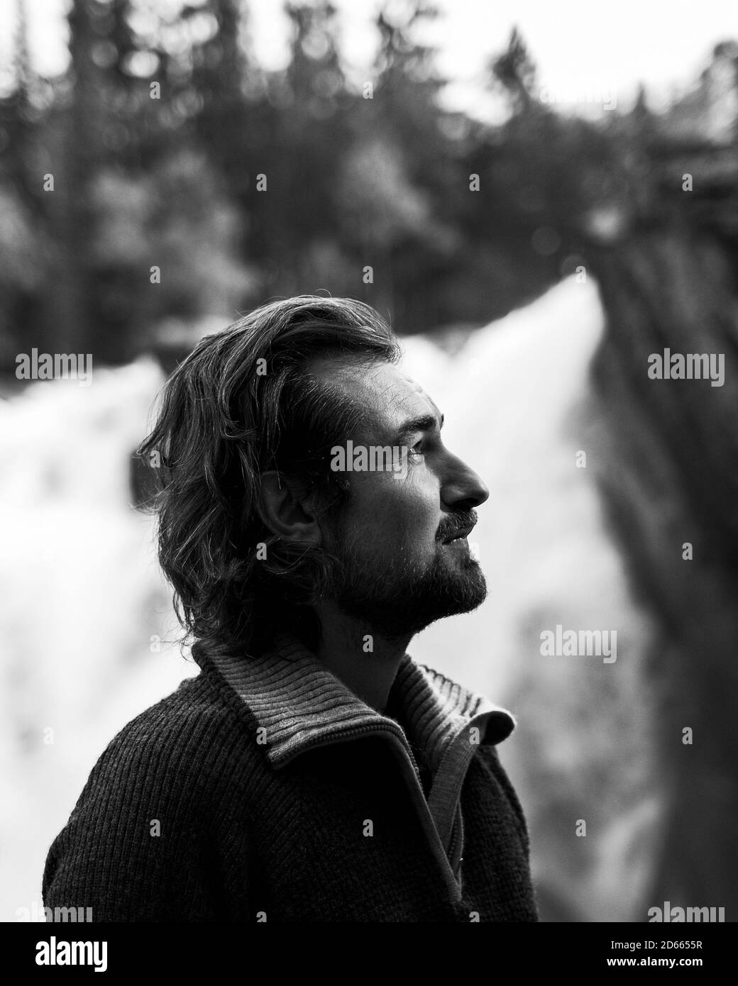 Vertical grayscale shot an attractive man Stock Photo - Alamy