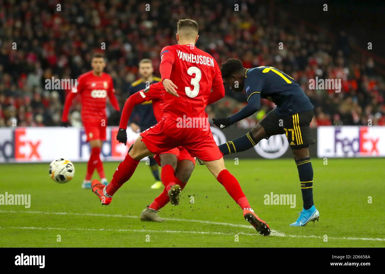 Arsenal's Bukayo Saka scores his side's second goal of the game Stock ...