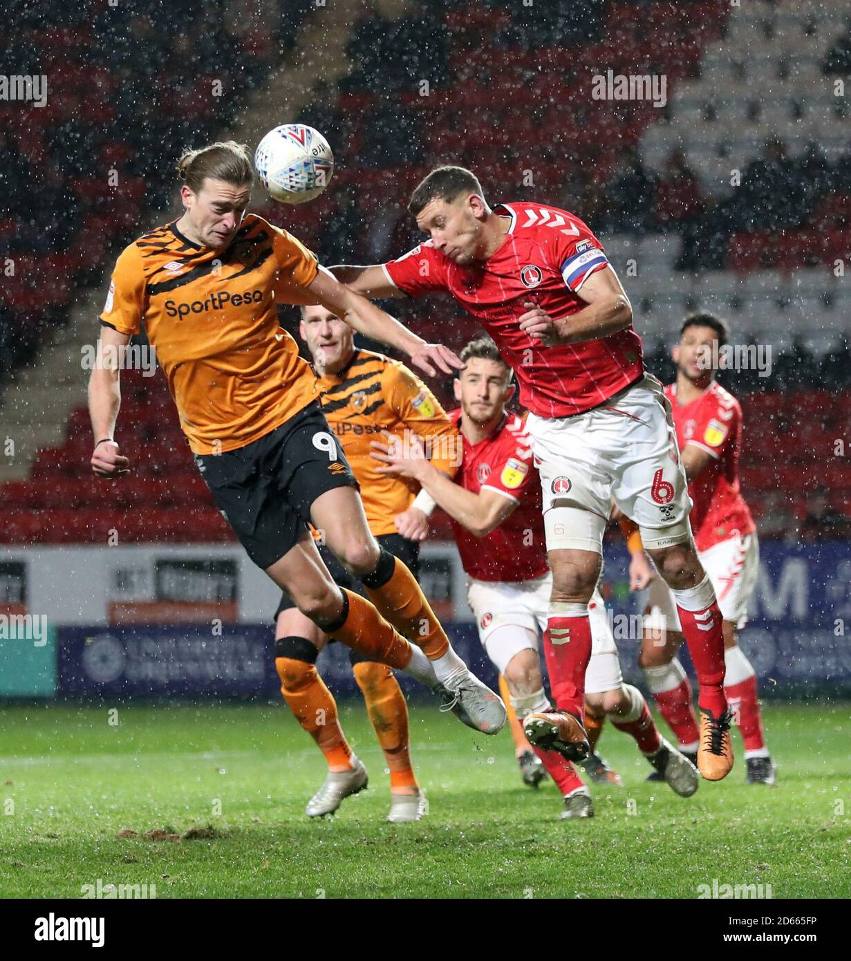 Hull City's Tom Eaves battles for the ball in the box with Charlton ...