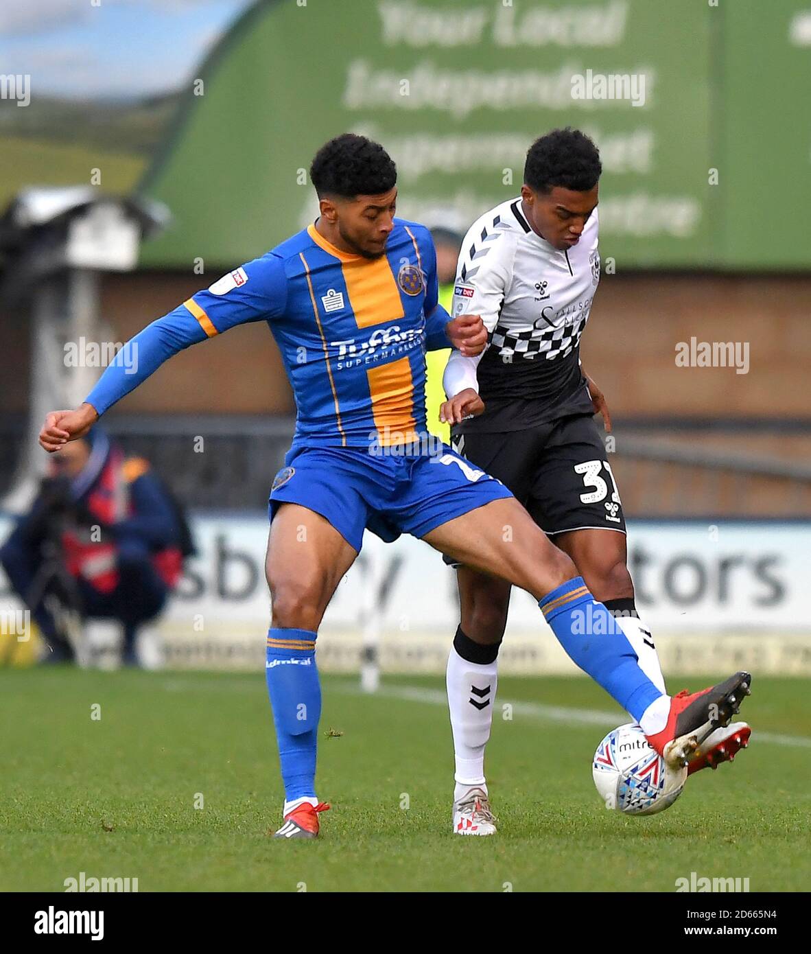 Coventry City's Sam McCallum and Shrewsbury Town's Josh Laurent battle ...