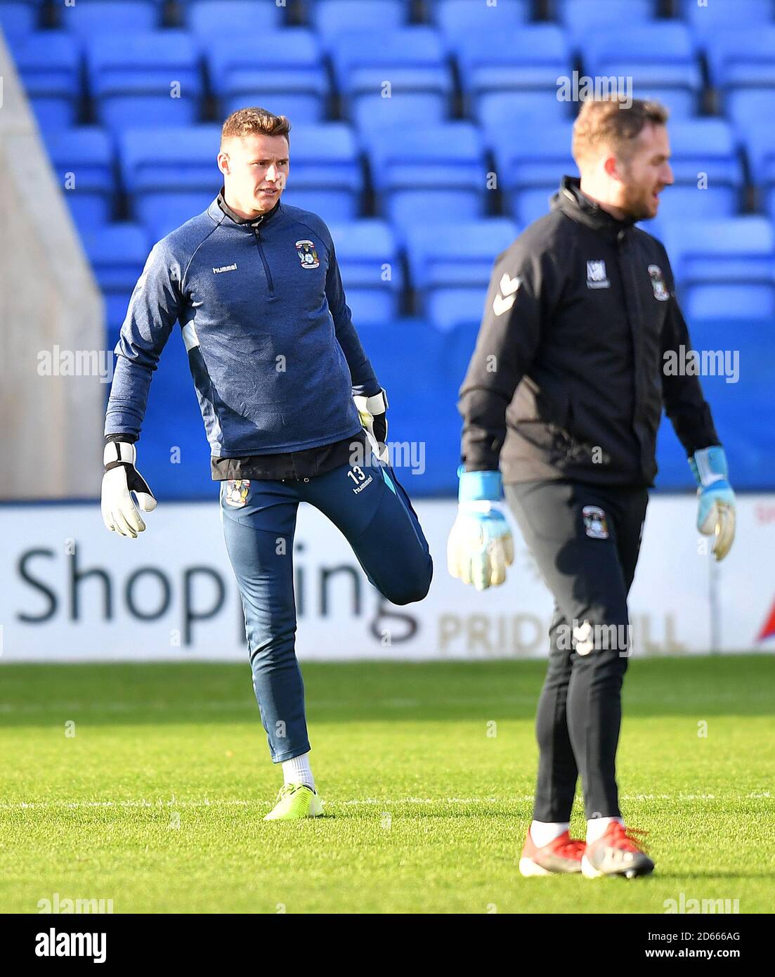 Coventry City goalkeeper Ben Wilson (left) warming up before the game ...