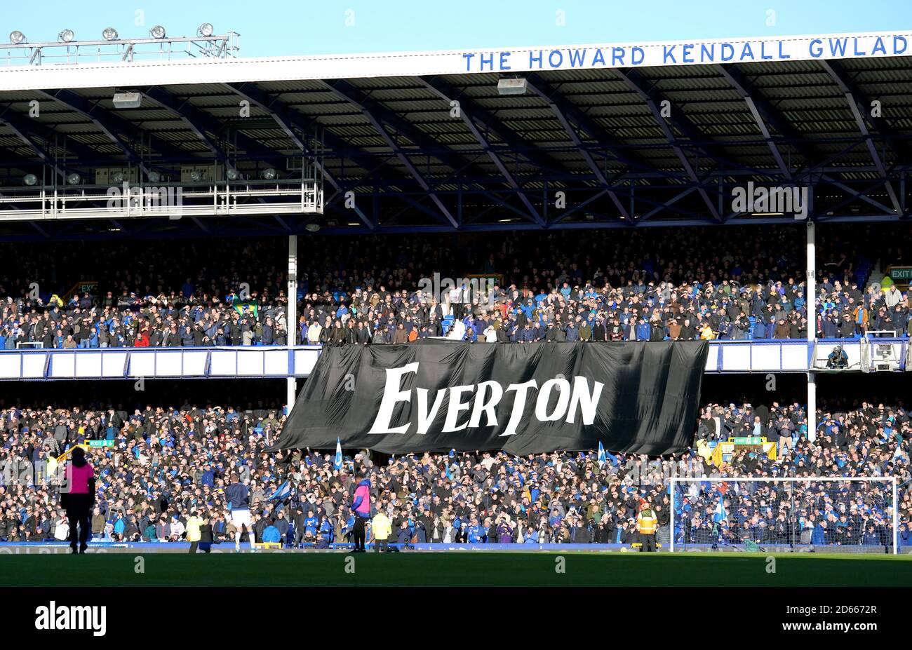 A general view of fans showing their support with an Everton banner ...