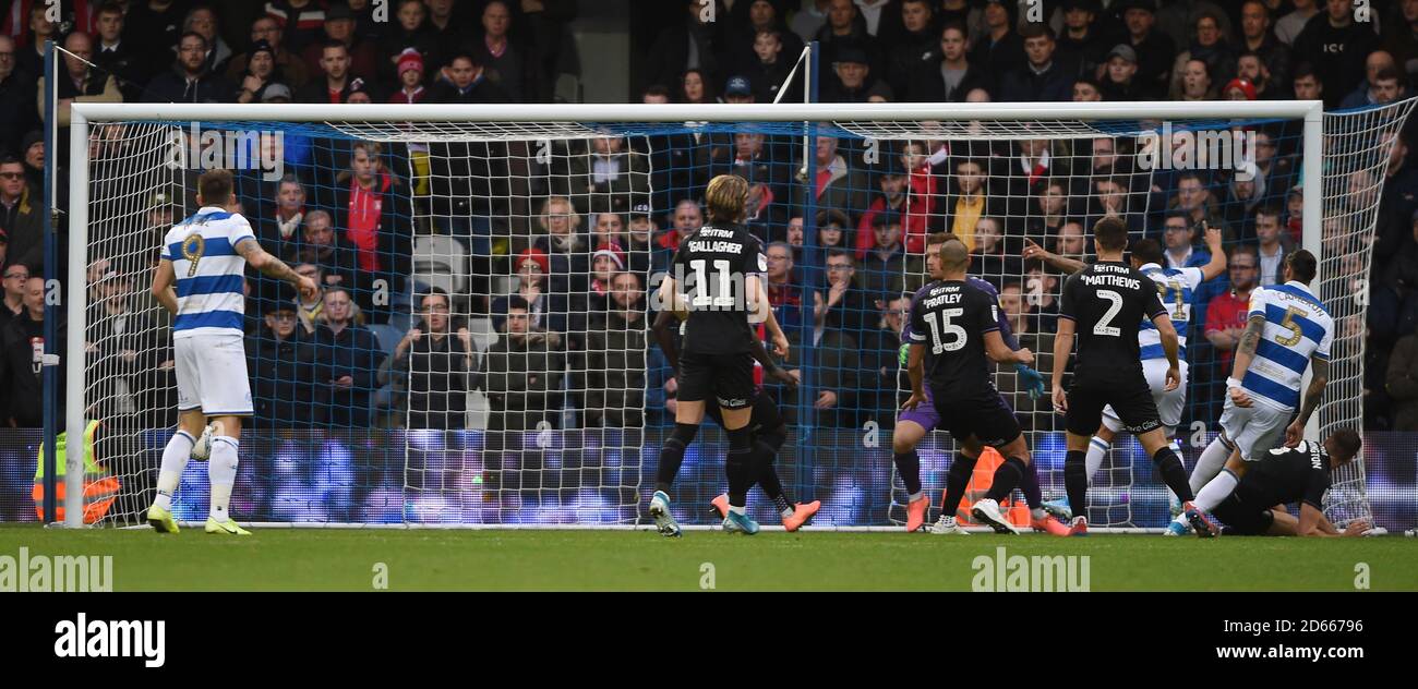 Queens Park Rangers' Geoff Cameron (far right) scores their first goal ...