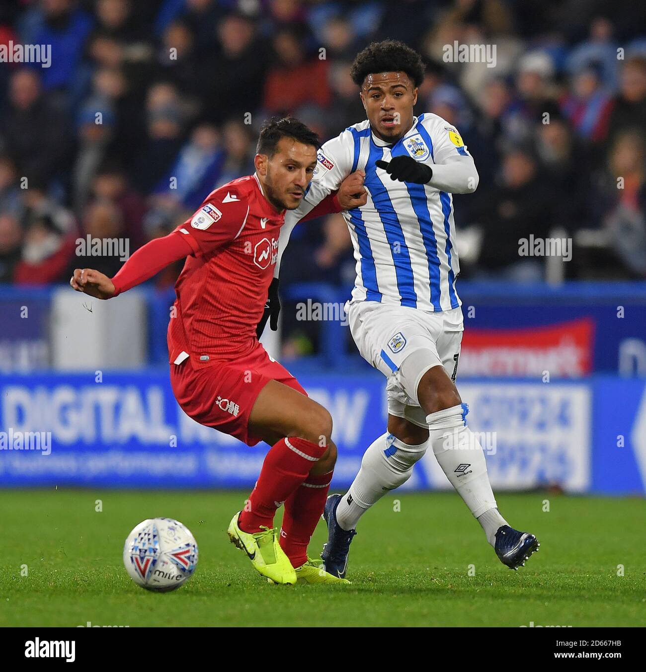 Nottingham Forest's JoÃ£o Carvalho holds off Huddersfield Town's Josh ...