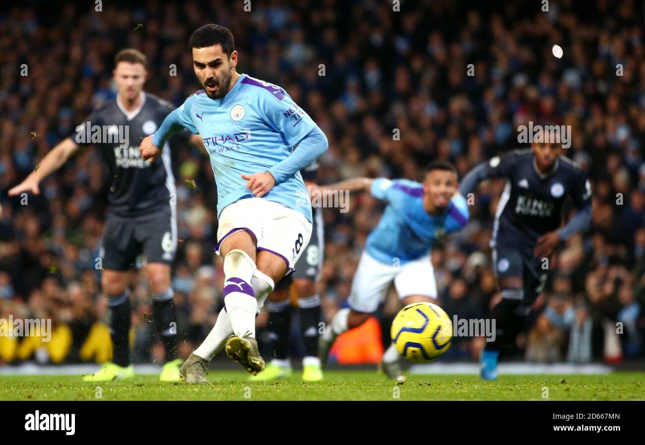 Manchester City's Ilkay Gundogan scores his side's second goal of the ...