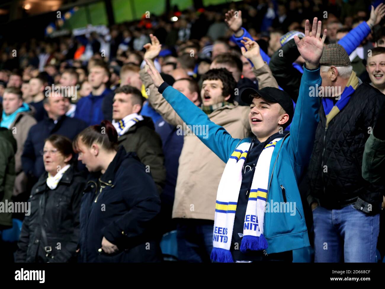 Leeds United's fans in the stands cheer on their team Stock Photo - Alamy