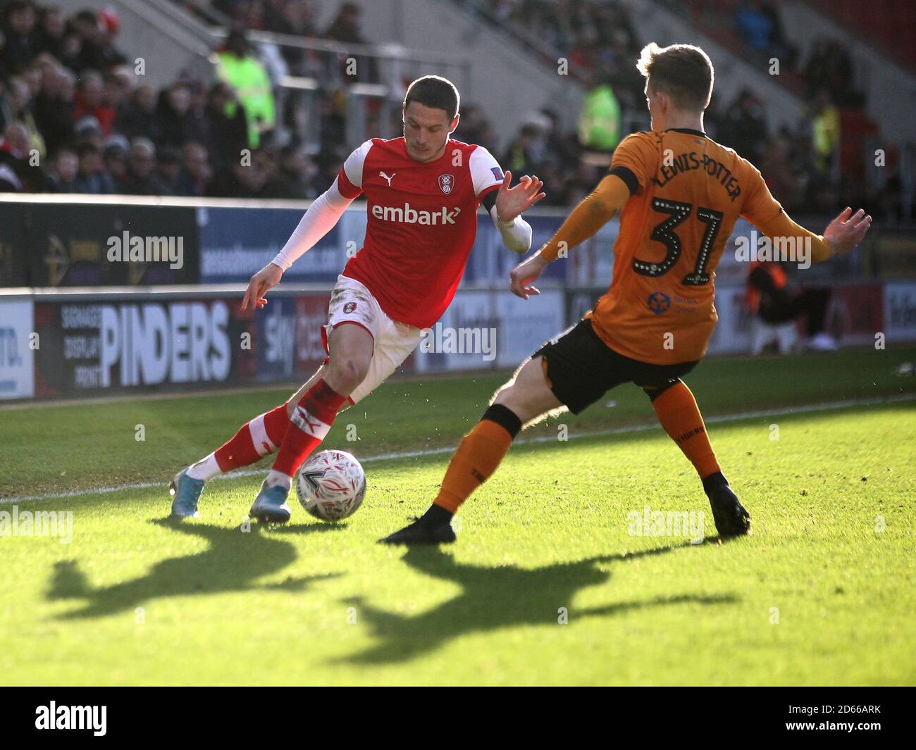 Rotherham United's Ben Wiles (left) and Hull City's Keane Lewis-Potter ...