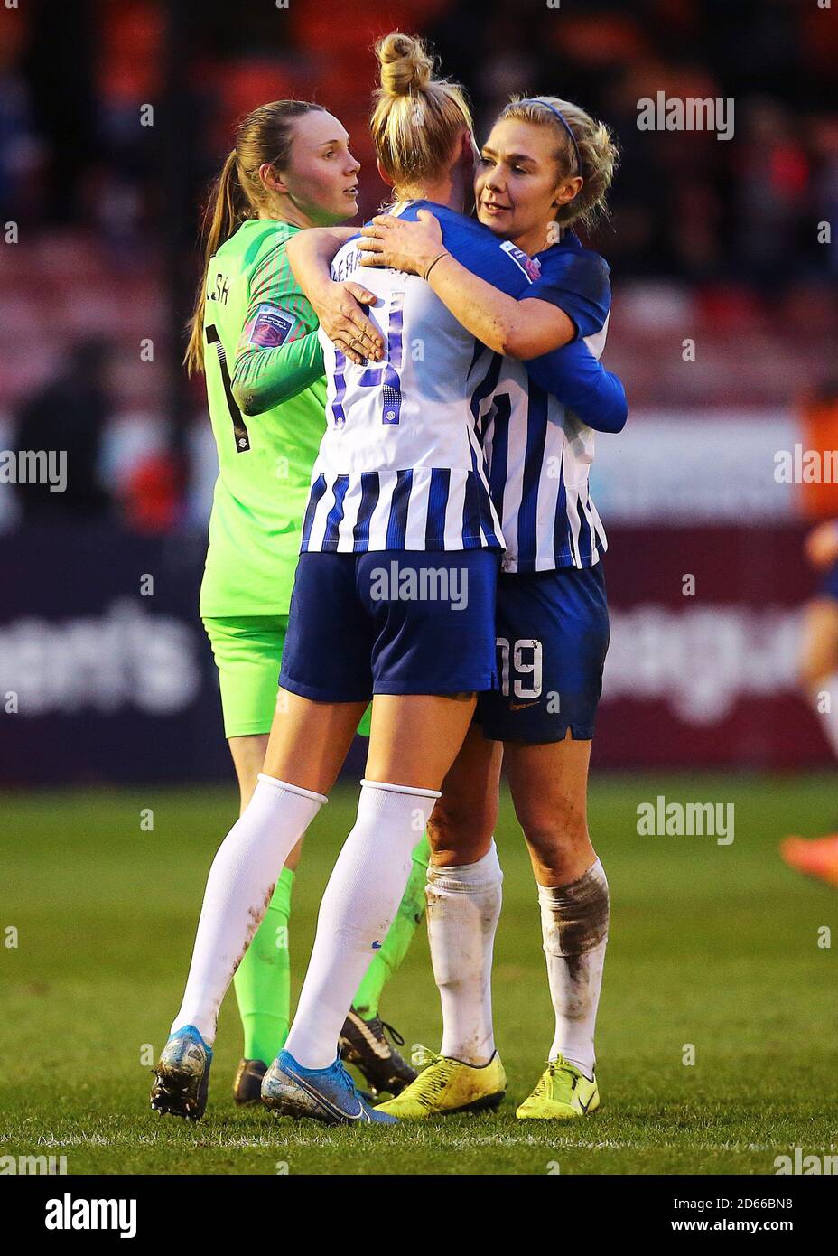 Brighton and Hove Albion's Danique Kerkdijk (left) and Emily Simpkins ...