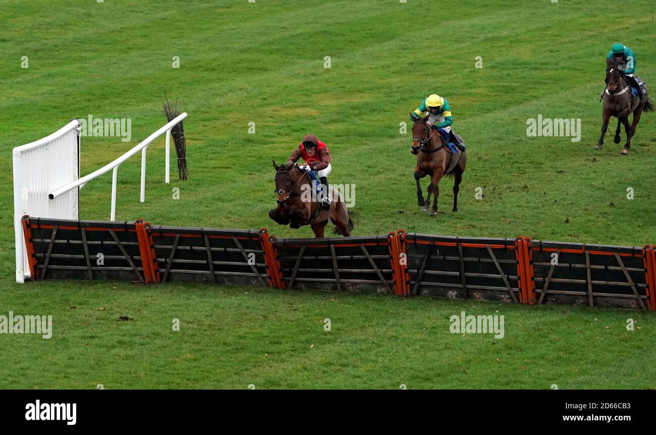 David Maxwell riding Dolphin Square clears the final hurdle during the ...