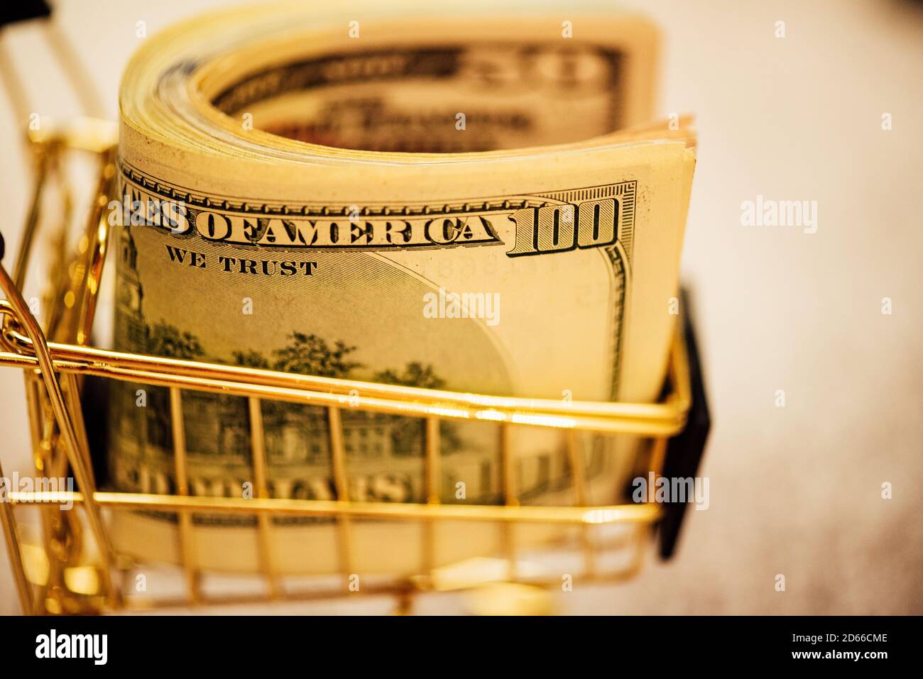 Financial concept, bank notes in the shopping cart Stock Photo - Alamy