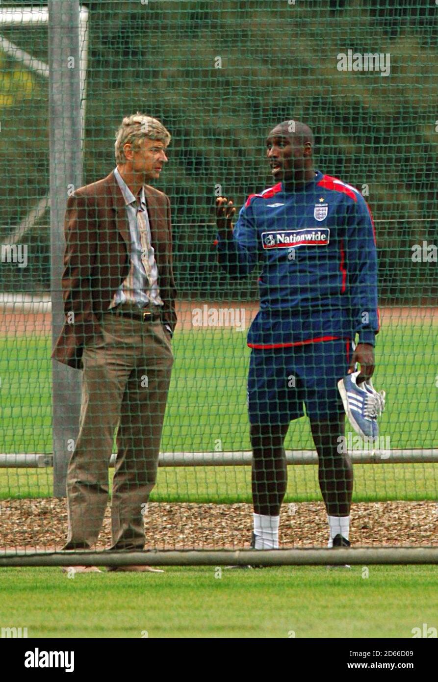 Arsenal manager Arsene Wenger with former Arsenal player and England ...