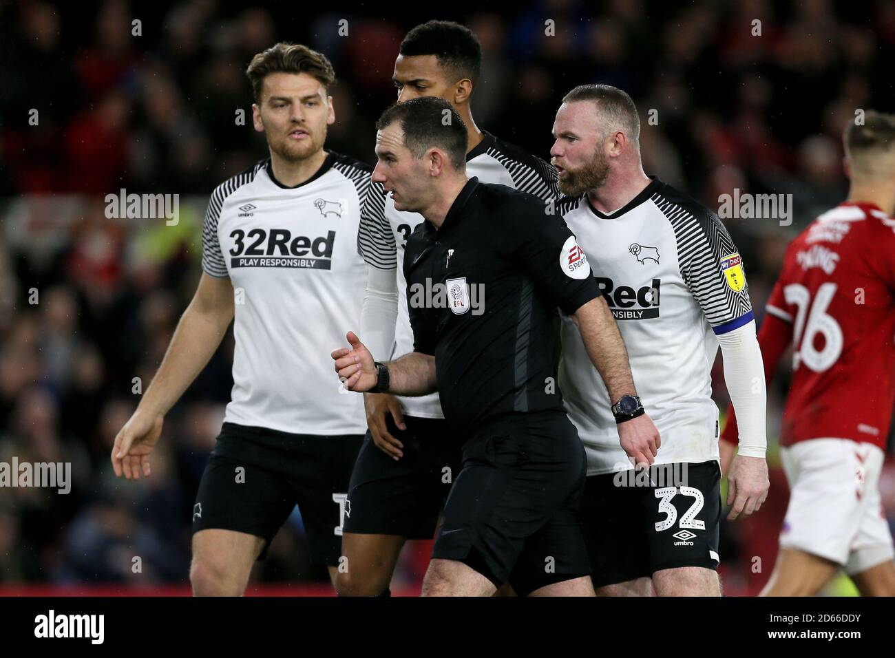Derby County's Wayne Rooney has words with Referee Tim Robinson Stock ...