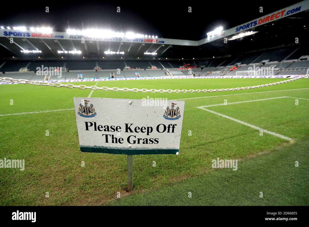 A 'Please Keep Off The Grass' sign on the pitch before kick-off Stock ...