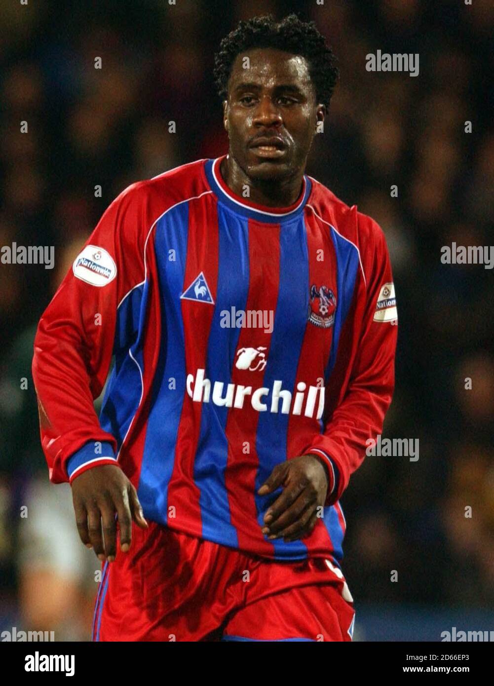 Crystal Palace's Aki Akinbiyi wearing his new colours against his old ...