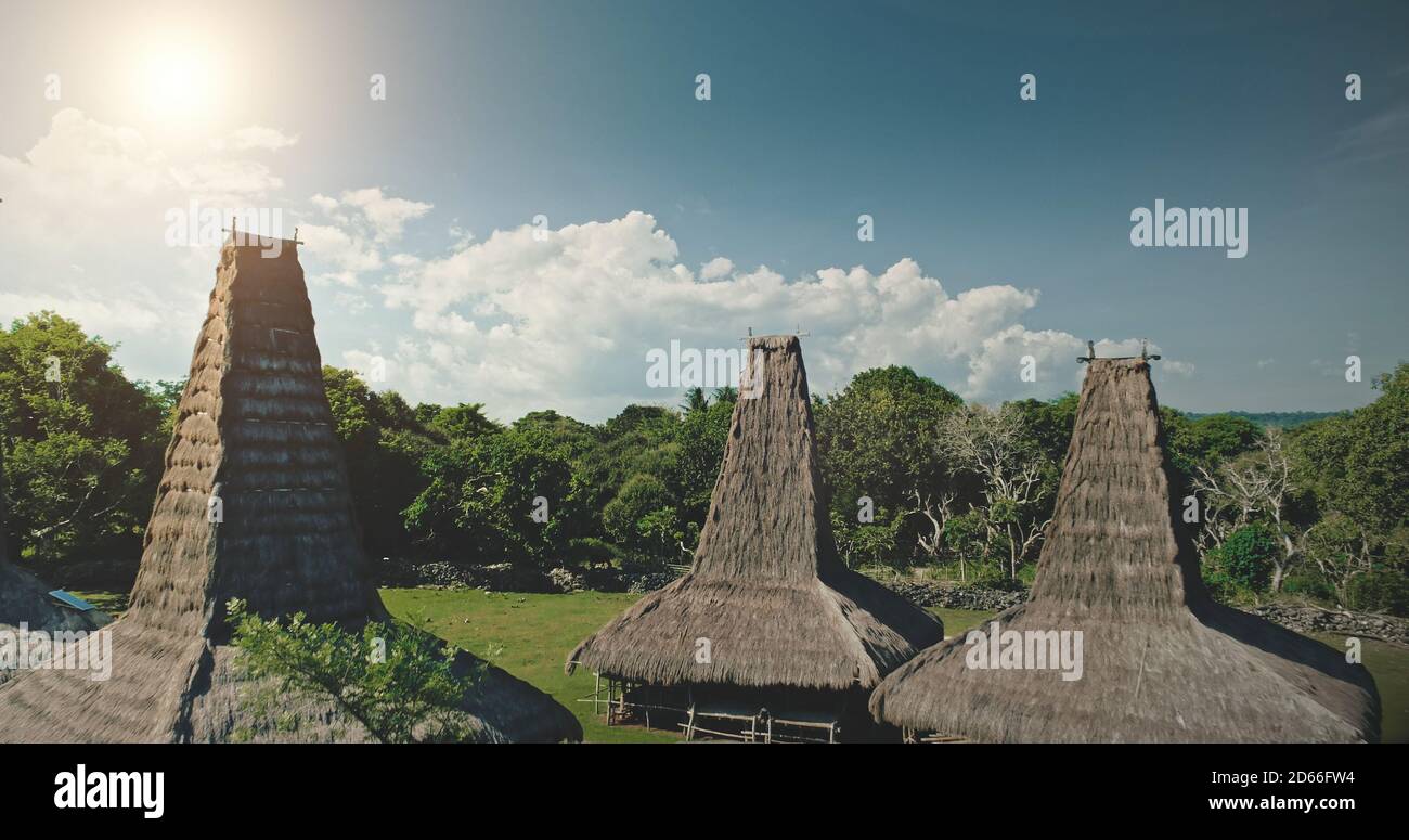 Sun light at high straw roof of traditional house in Kodi village ...