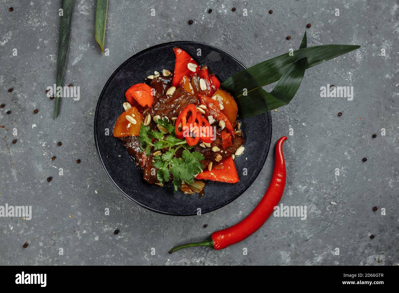 Beef wok. Traditional chinese mongolian beef stir fry in chinese cast ...