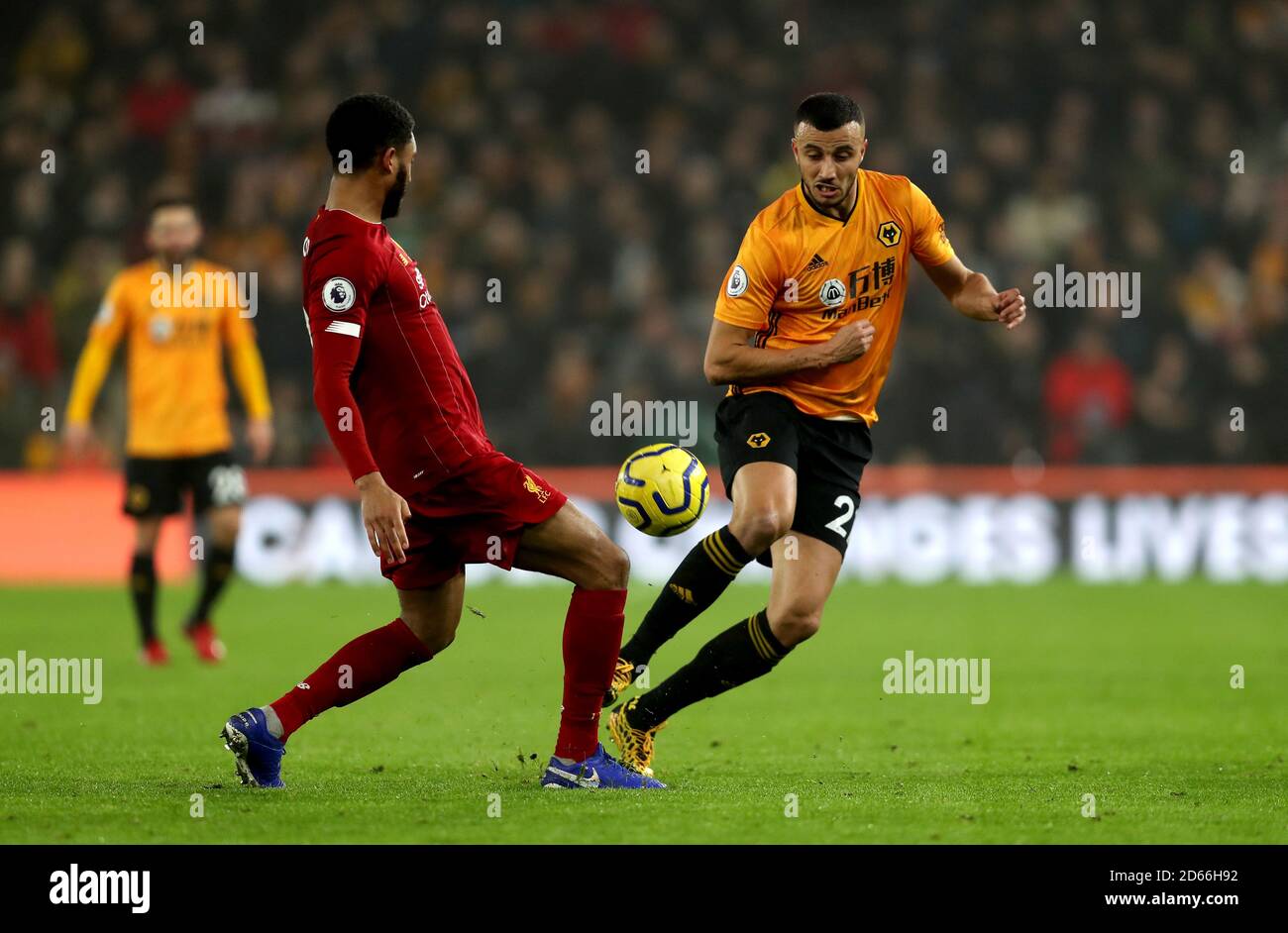 Liverpool's Joe Gomez (left) and Wolverhampton Wanderers' Romain Saiss ...