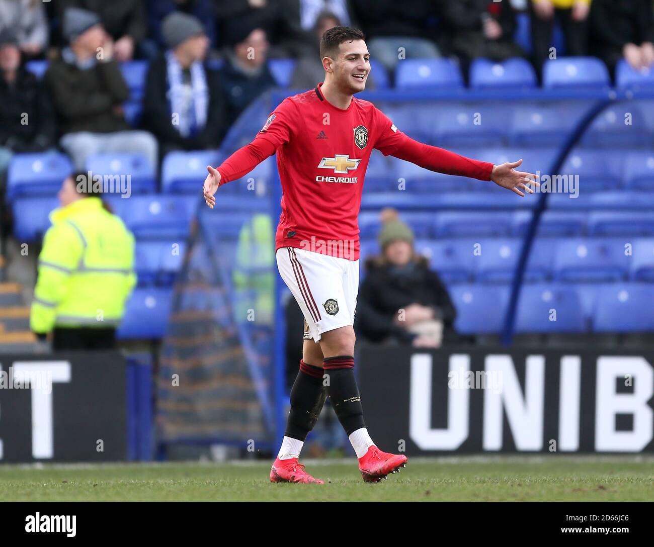 Manchester United's Diogo Dalot celebrates his side's third goal of the ...