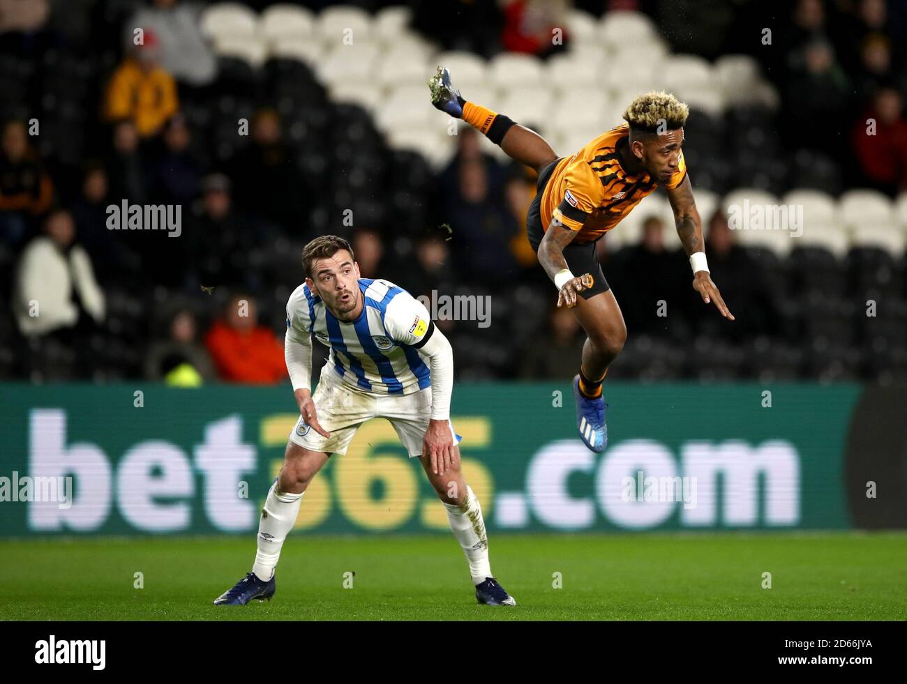 Hull City's Mallik Wilks (right) and Huddersfield Town's Harry Toffolo ...