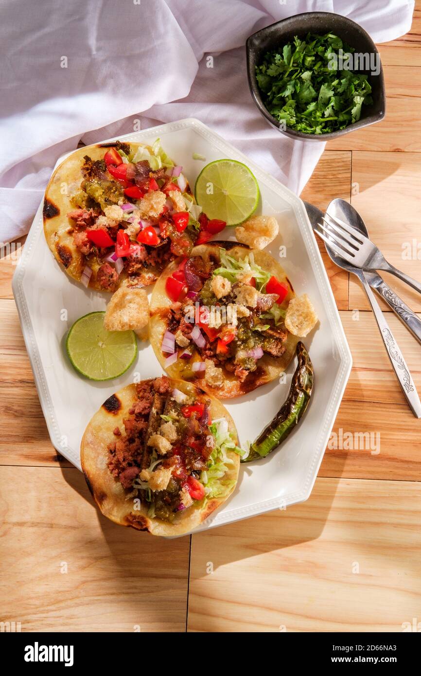 Mexican longaniza sausage and steak street tacos campechanos with ...