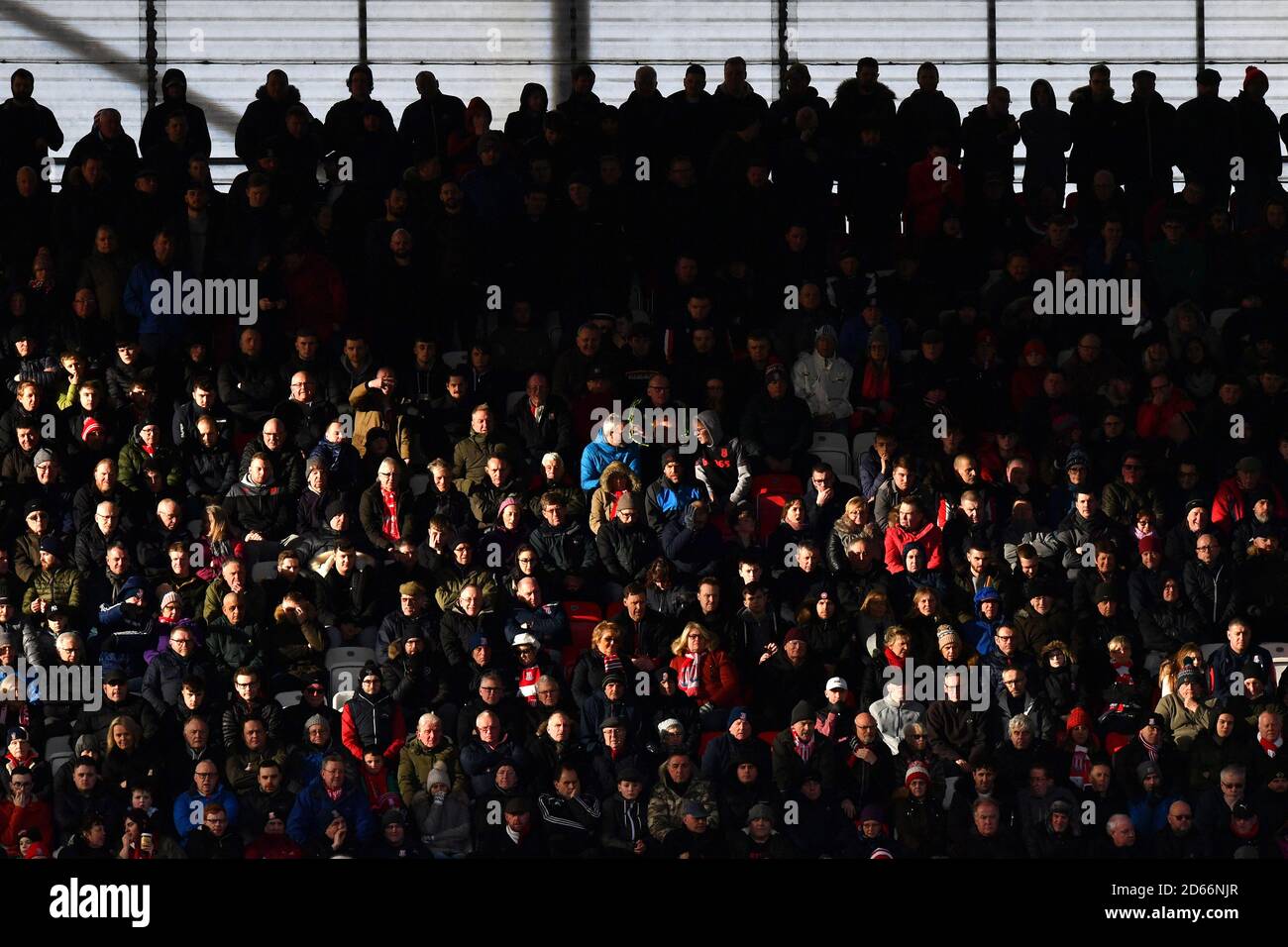 Stoke fans in the stands Stock Photo - Alamy