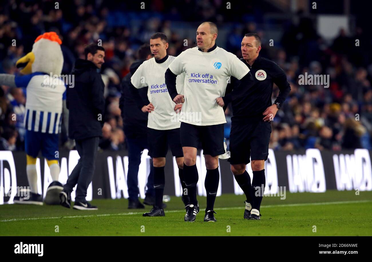 Match officials Adrian Holmes, Simon Bennett and referee Kevin Friend ...
