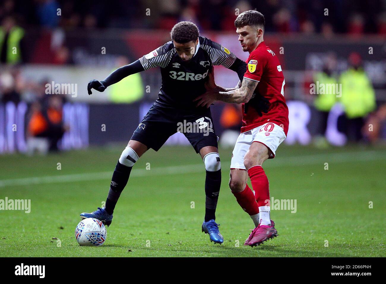 Derby County's Jayden Bogle (left) and Bristol City's Jamie Paterson ...