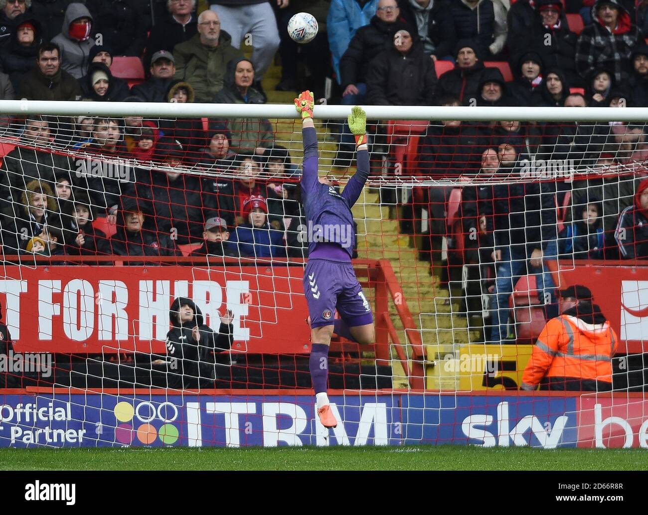 Charlton Athletic goalkeeper Dillon Phillips pushes a very long range ...