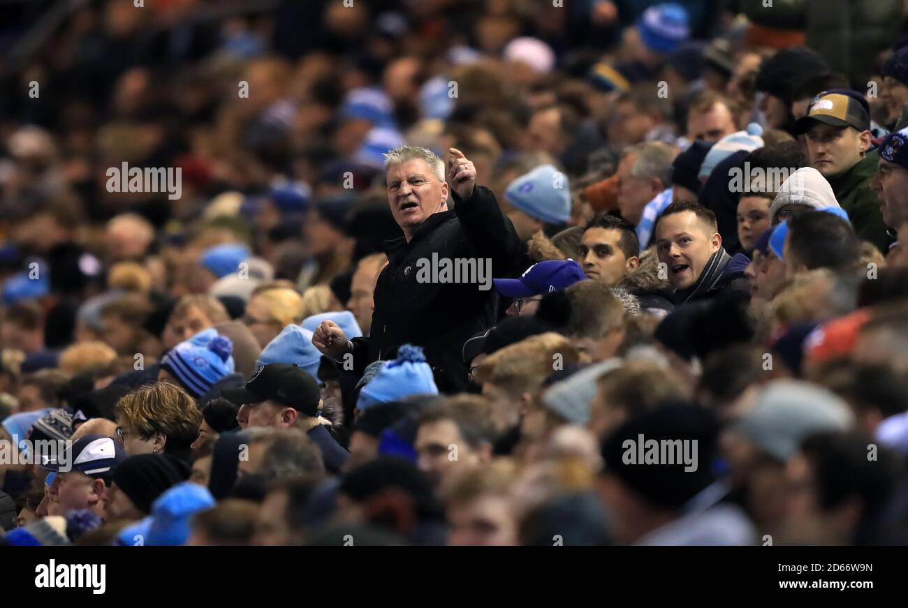 A fan in the stands shows his support Stock Photo - Alamy