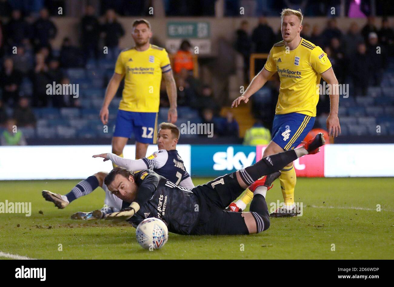 Birmingham City's goalkeeper Lee Camp saves a shot from Millwall's Jed ...