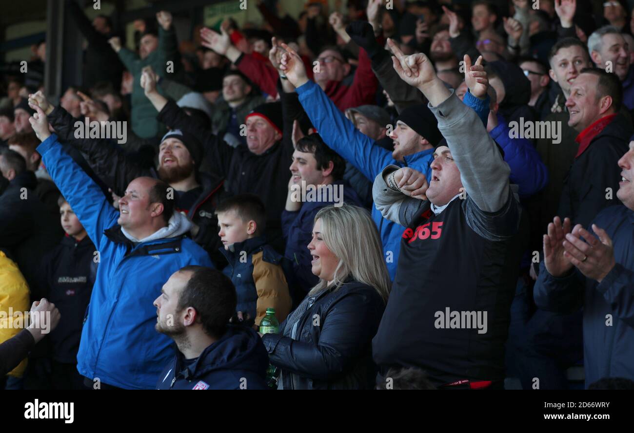 Stoke City fans celebrate their side score their first goal of the game ...