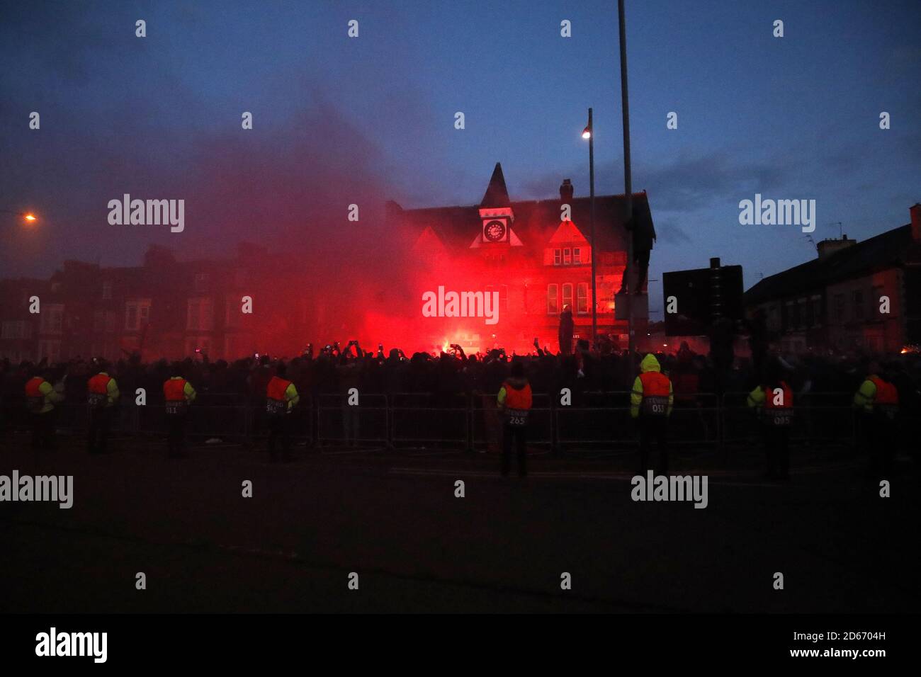 Fans let off flares ahead of the UEFA Champions League round of 16 ...