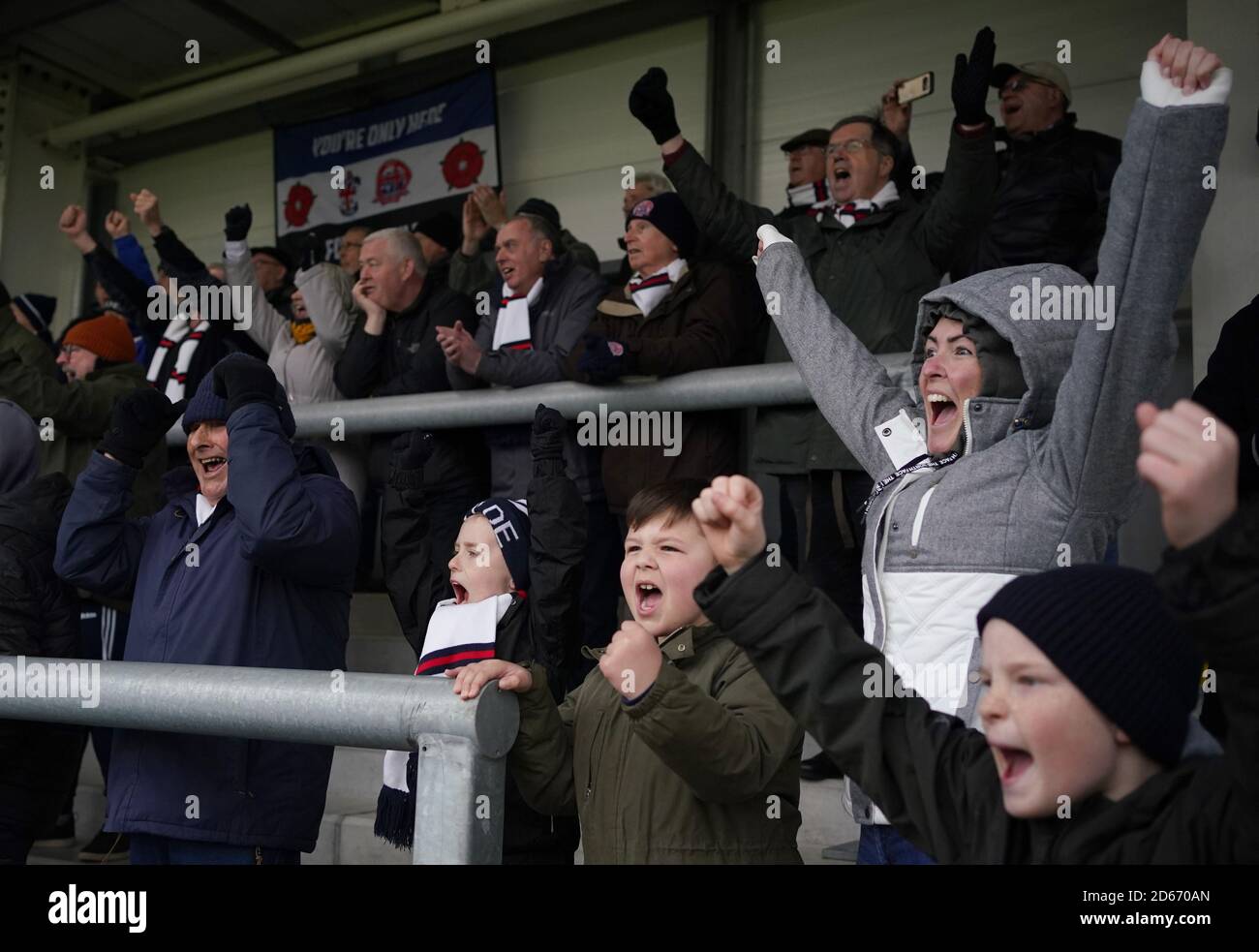 AFC Fylde fans celebrate their side's first goal of the game scored by ...
