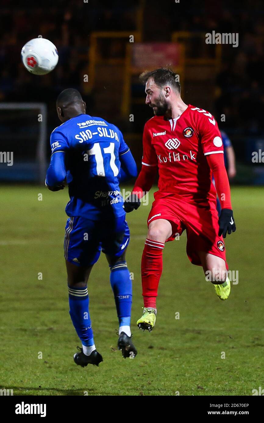 FC Halifax Town's Tobi Shi-Silva and Ebbsfleet's Alex Lawless during ...