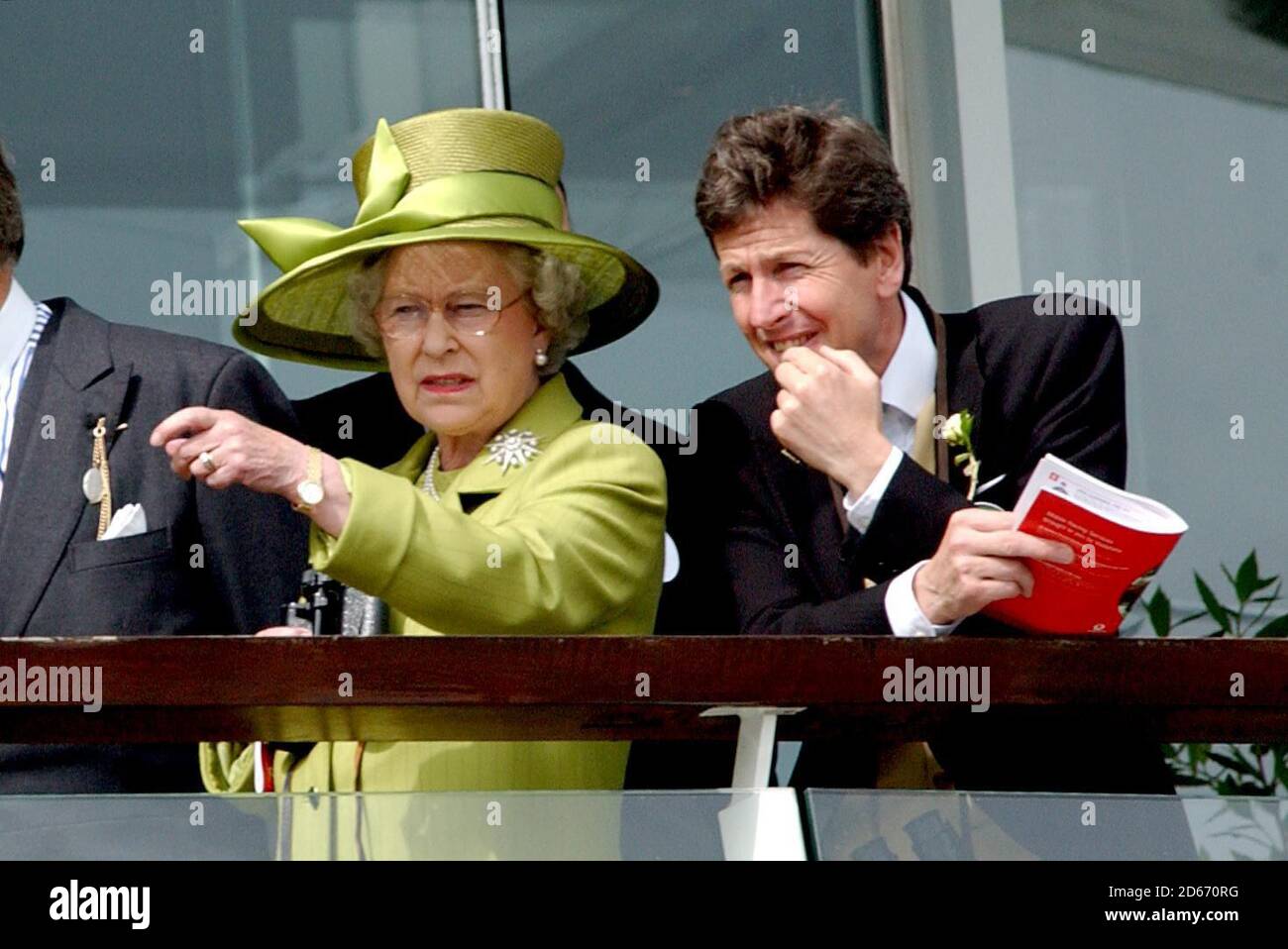The Queen points out the winner of The Derby Stock Photo - Alamy