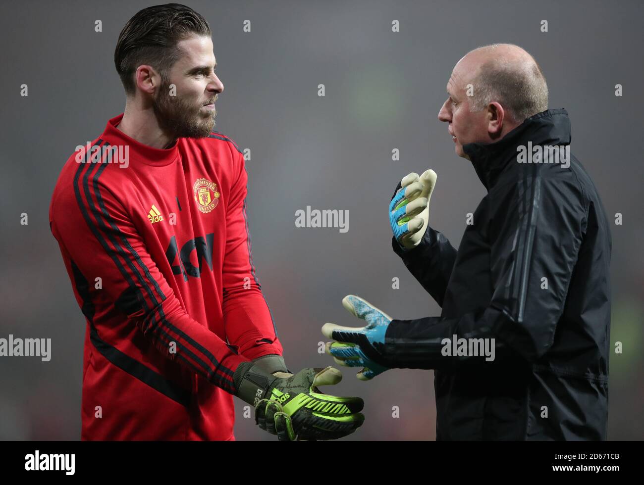 Manchester United goalkeeper coach Richard Hartis (right) and ...