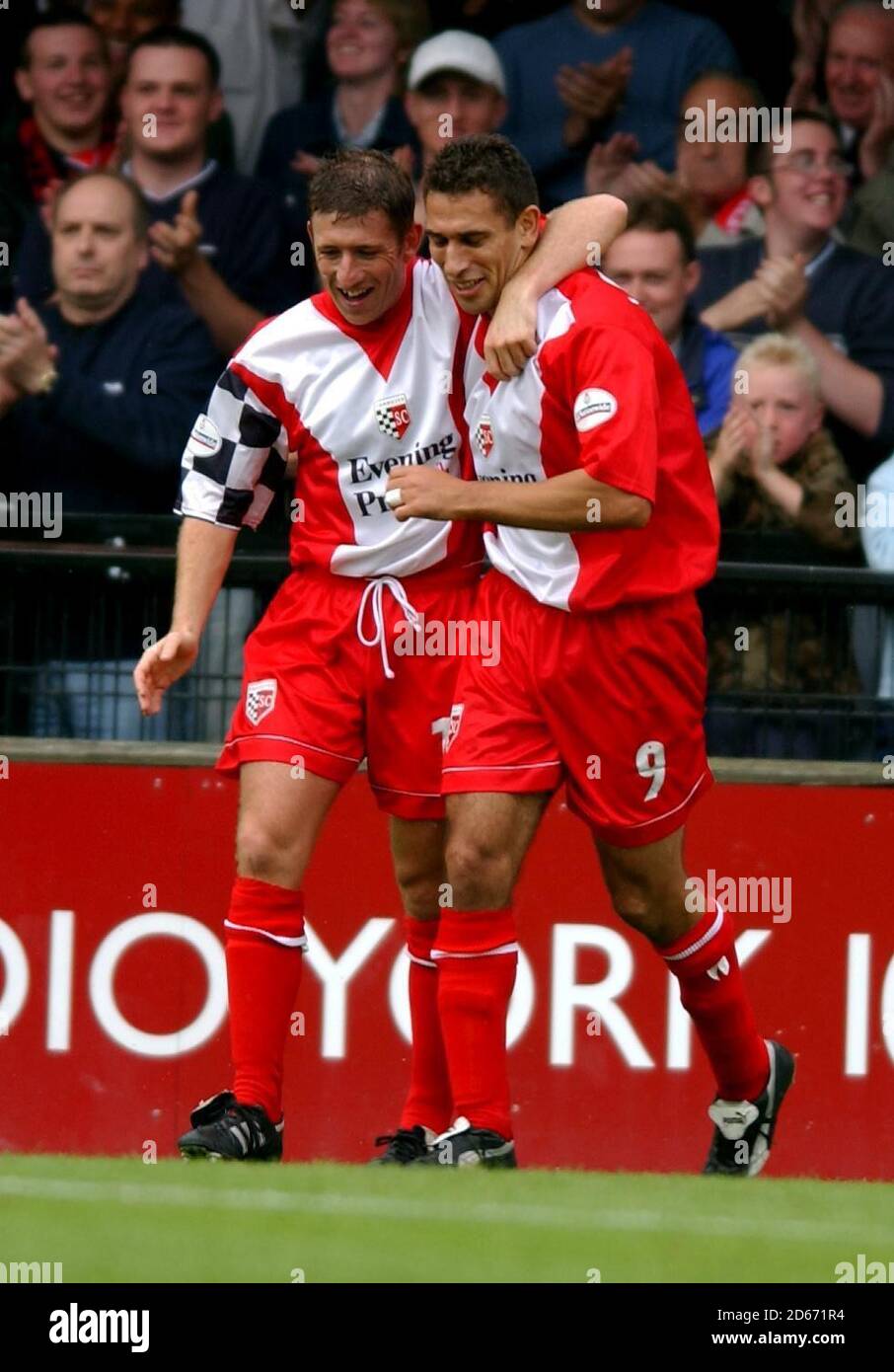 Scorer of York's first goal Peter Duffield (l) congratulates Lee Nogan ...